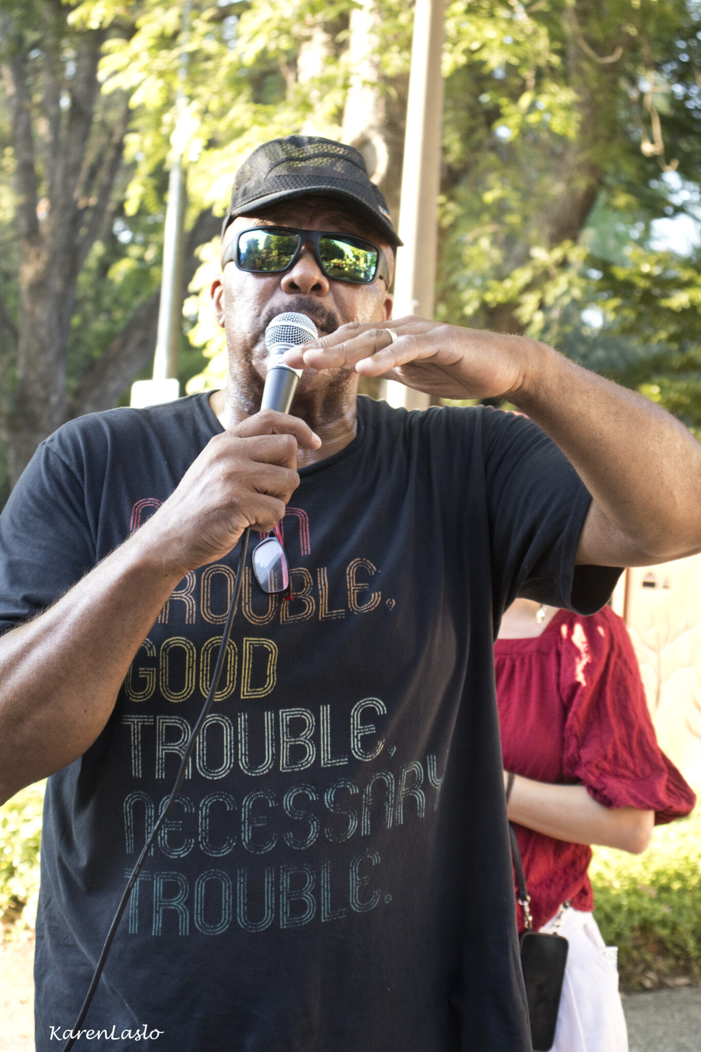 Upbeat 'Good Trouble' rally draws hundreds to city hall plaza ...